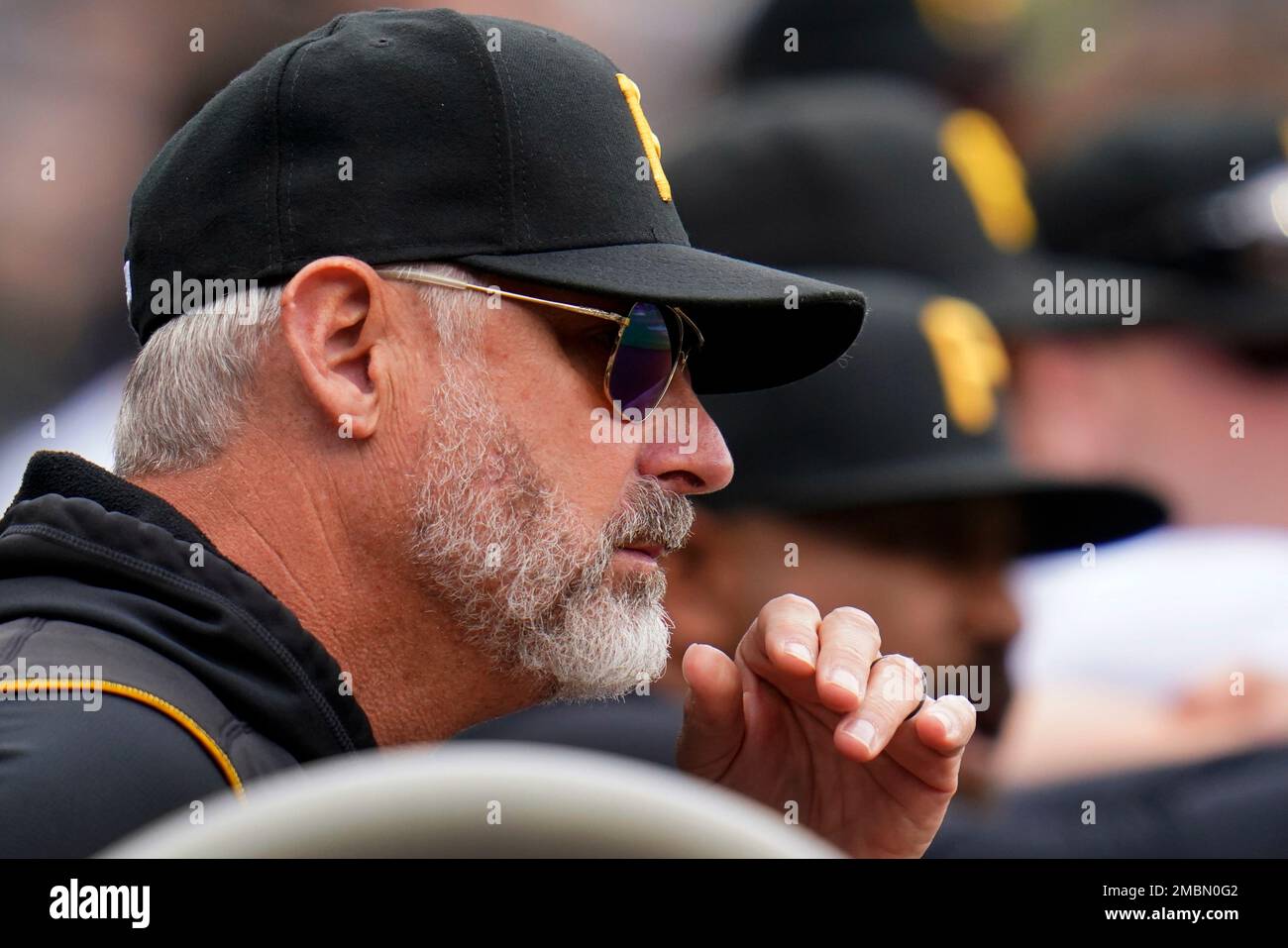 Pittsburgh Pirates manager Derek Shelton stands on the dugout steps ...