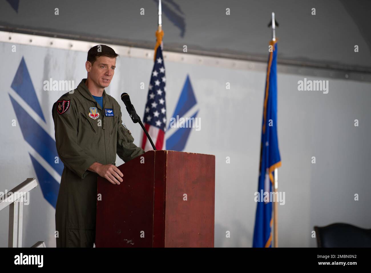 U.S. Air Force Col. Russell Cook, 23rd Wing commander, gives a speech ...