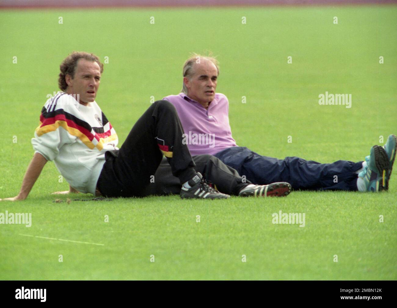 West German national soccer team manager Franz Beckenbauer, left, and ...