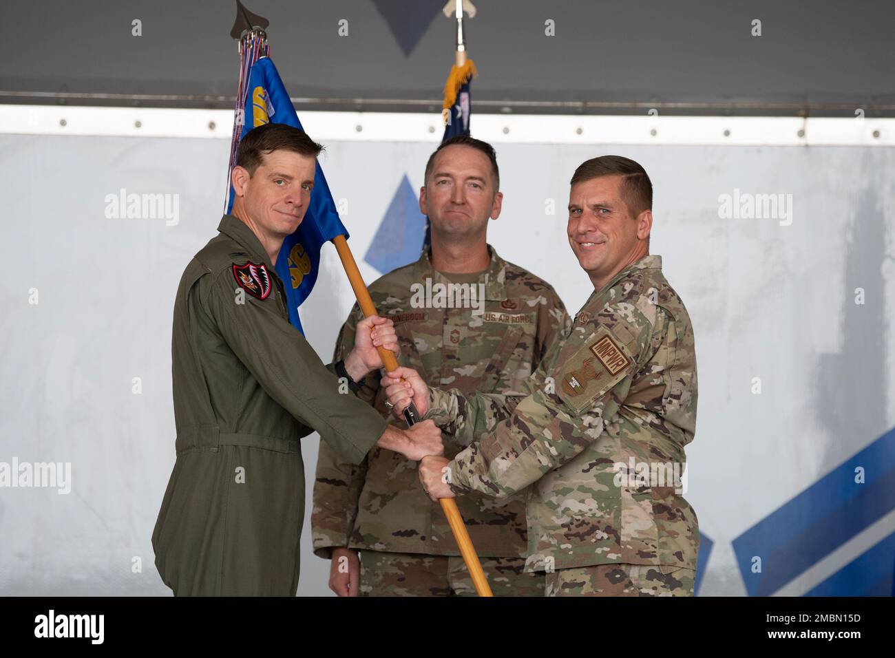 U.S. Air Force Col. Russell Cook, 23rd Wing commander, receives a ...
