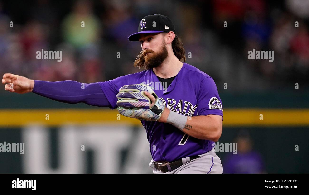 Colorado Rockies second baseman Brendan Rodgers throws to first during ...