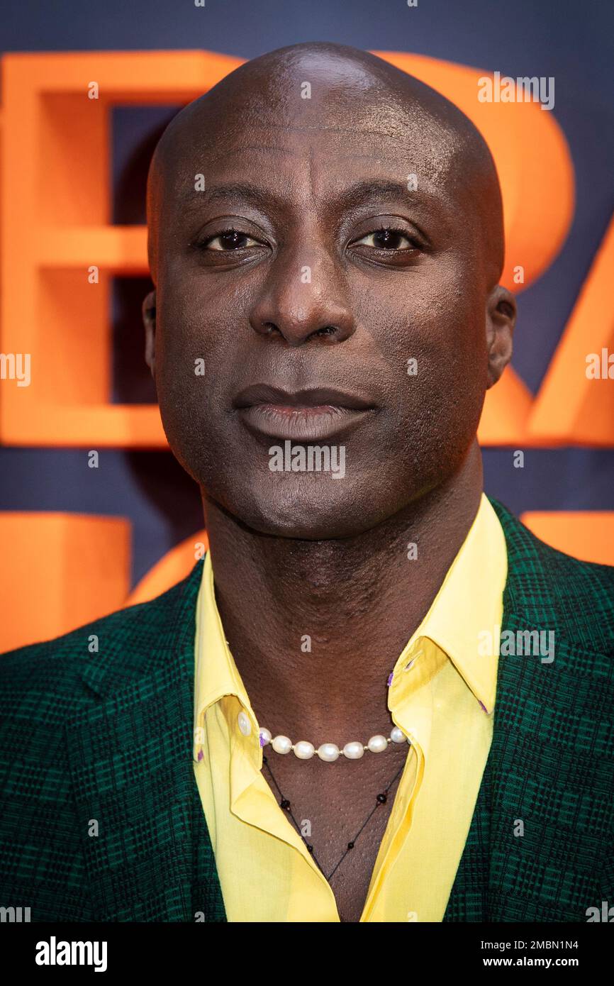 Ozwald Boateng poses for photographers upon arrival at the premiere of ...