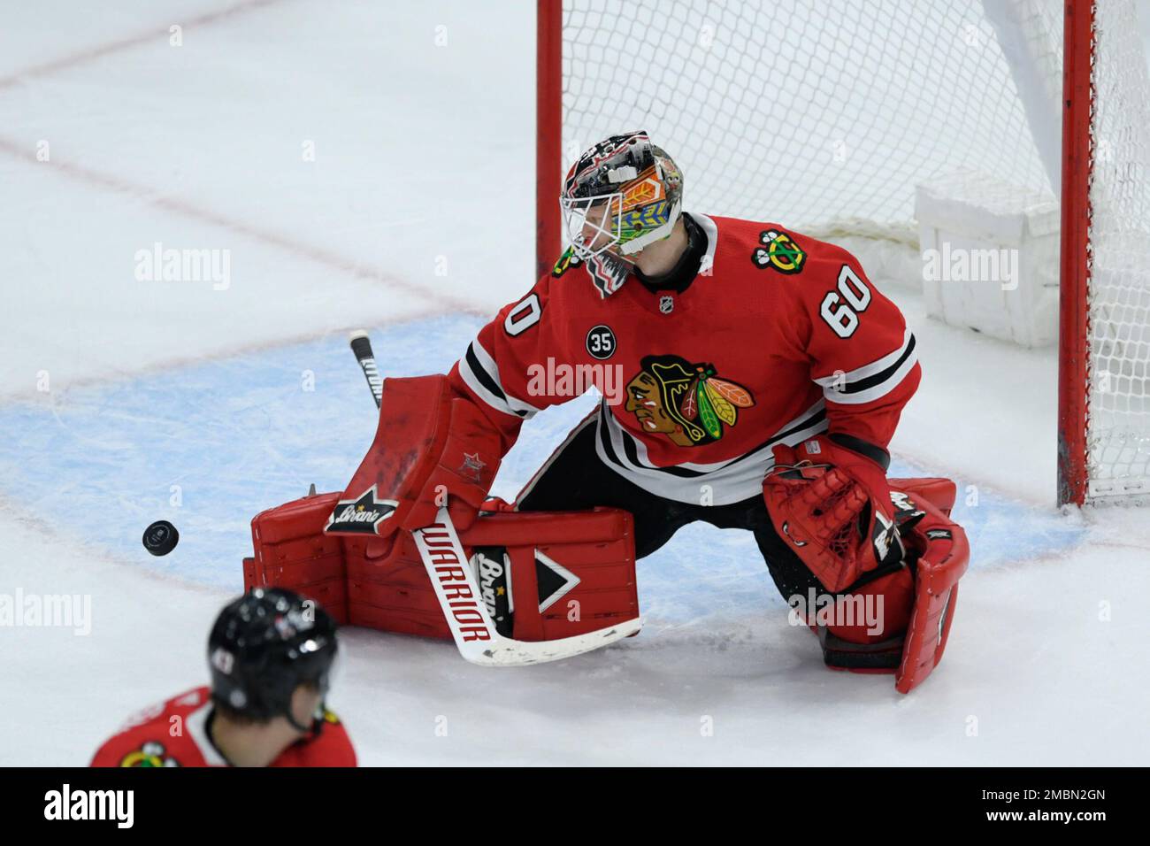 Chicago Blackhawks goaltender Collin Delia (60) makes a save during the ...