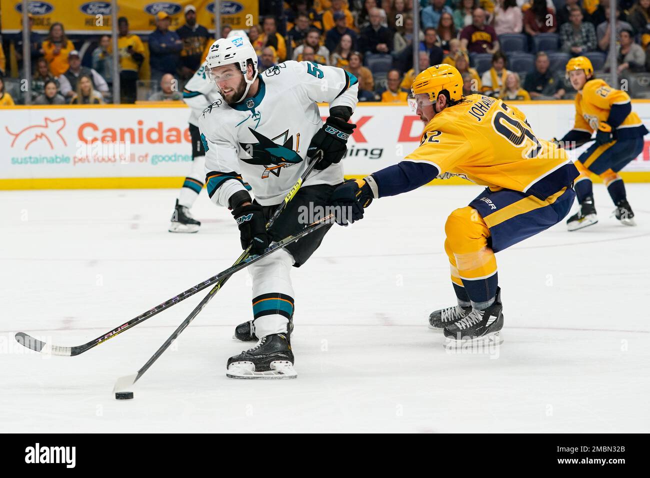 Nashville Predators' Ryan Johansen (92) defends against San Jose Sharks ...