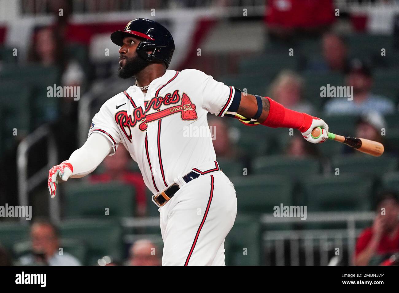 Atlanta Braves' Marcell Ozuna watches his double during the third ...