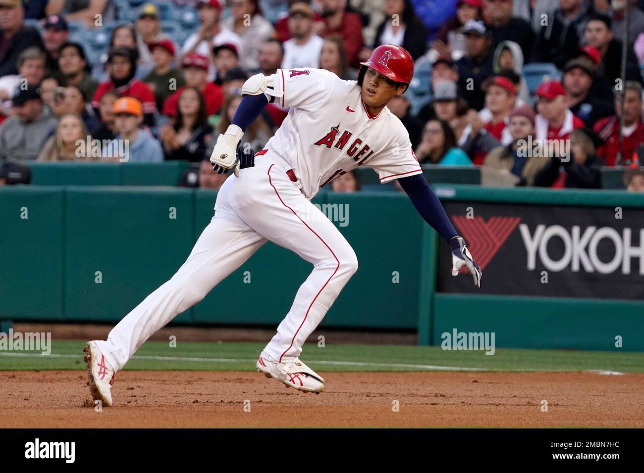 Los Angeles Angels' Shohei Ohtani runs back to first after overrunning ...