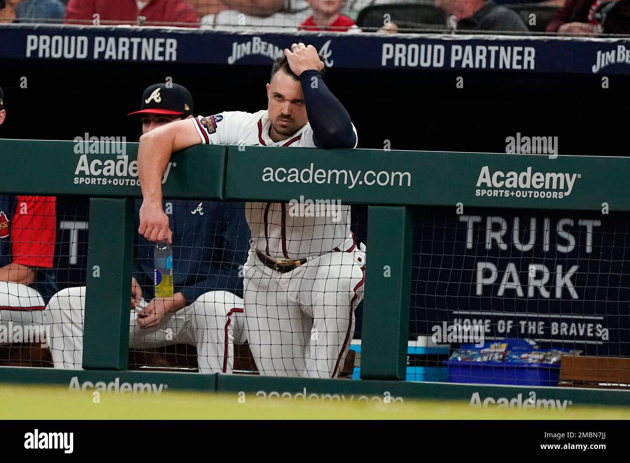 Atlanta Braves outfielder Adam Duvall watches from the dugout during a ...