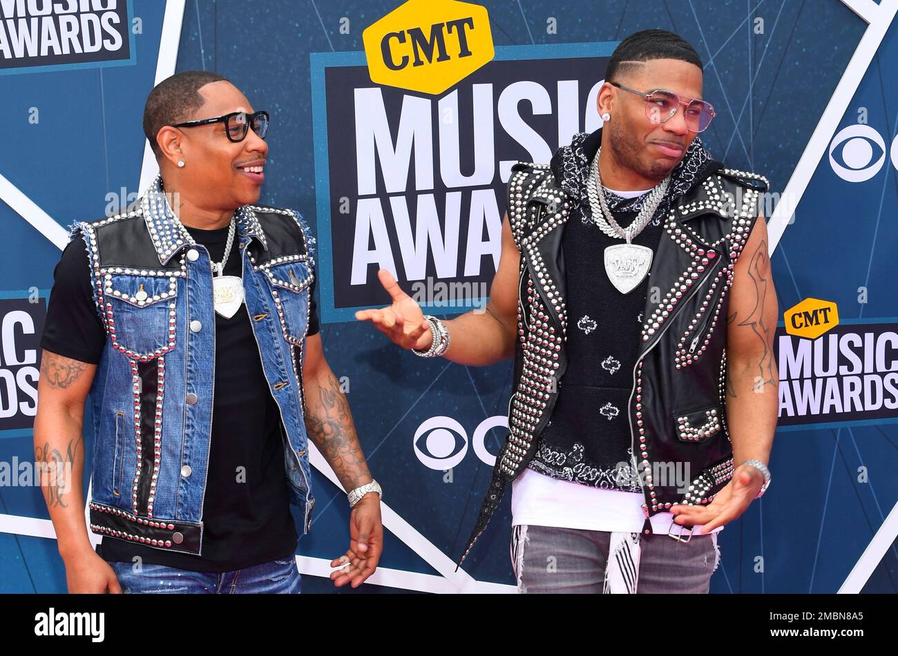 City Spud, left, and Nelly arrive at the CMT Music Awards on Monday ...