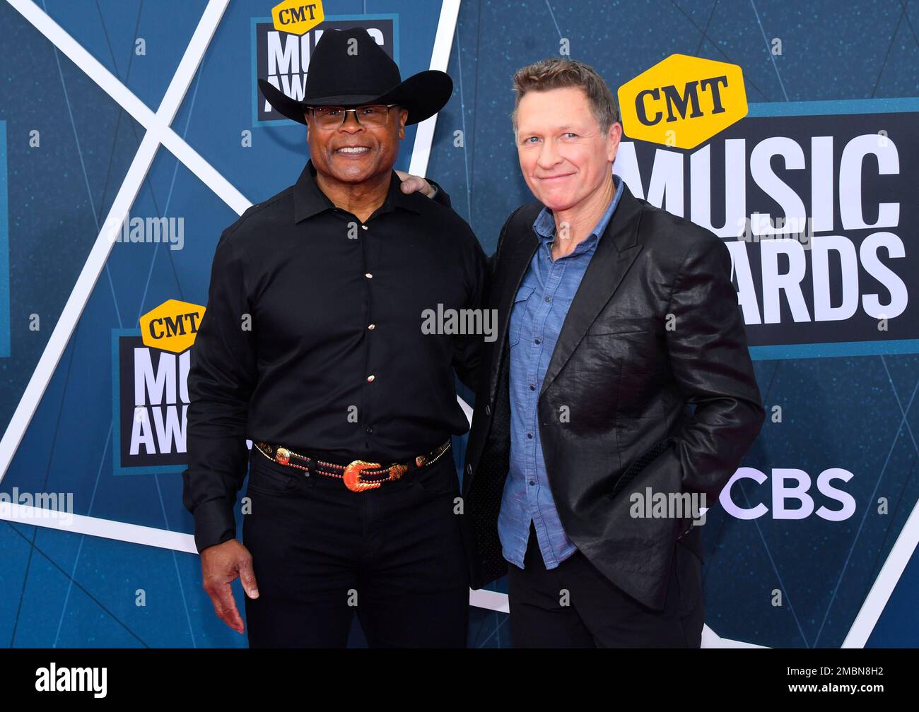 Mike Singletary, left, and Craig Morgan arrive at the CMT Music Awards ...