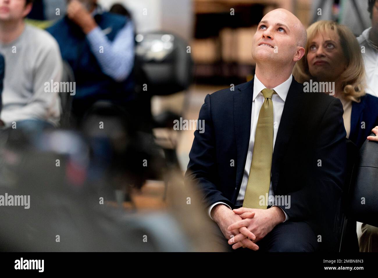 Chris Caputo sits in the audience during an NCAA college basketball ...