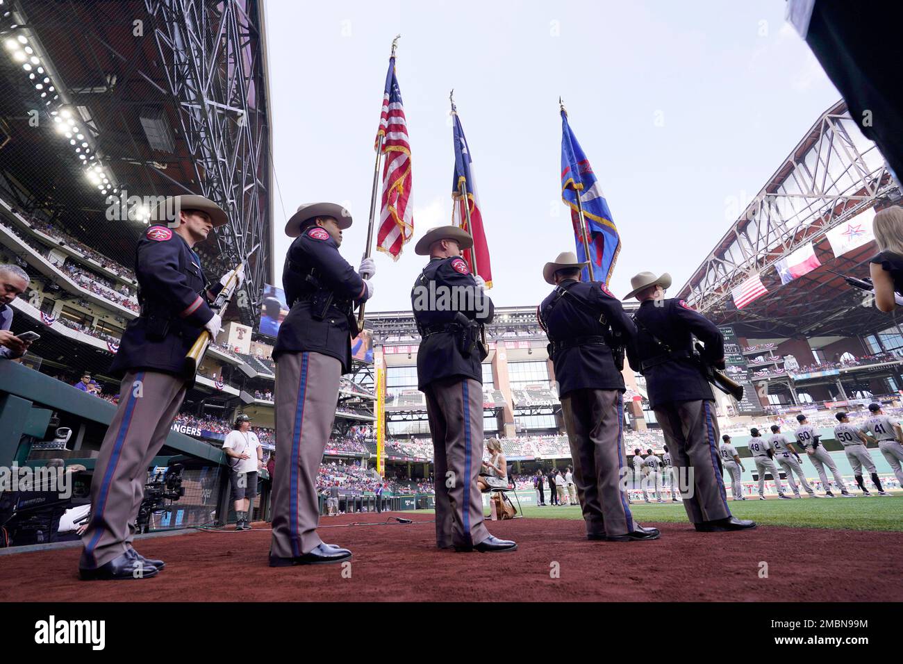 An honor guard with the Texas Department of Public Safety stands on the ...