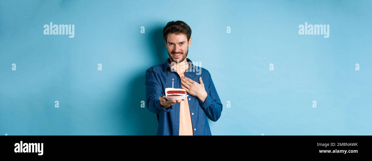 Celebration and holiday concept. Man blushing and wishing happy ...