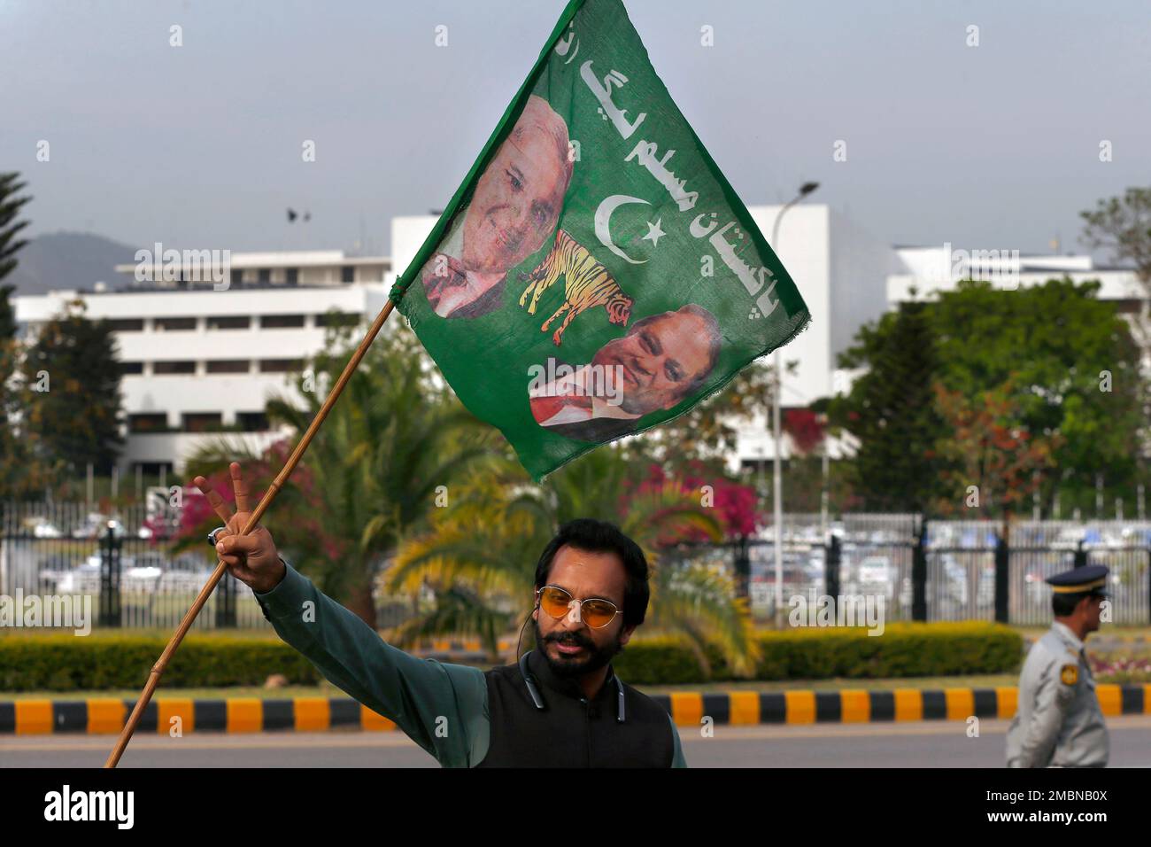 A supporter of newly elected Pakistani Prime Minister Shahbaz Sharif ...