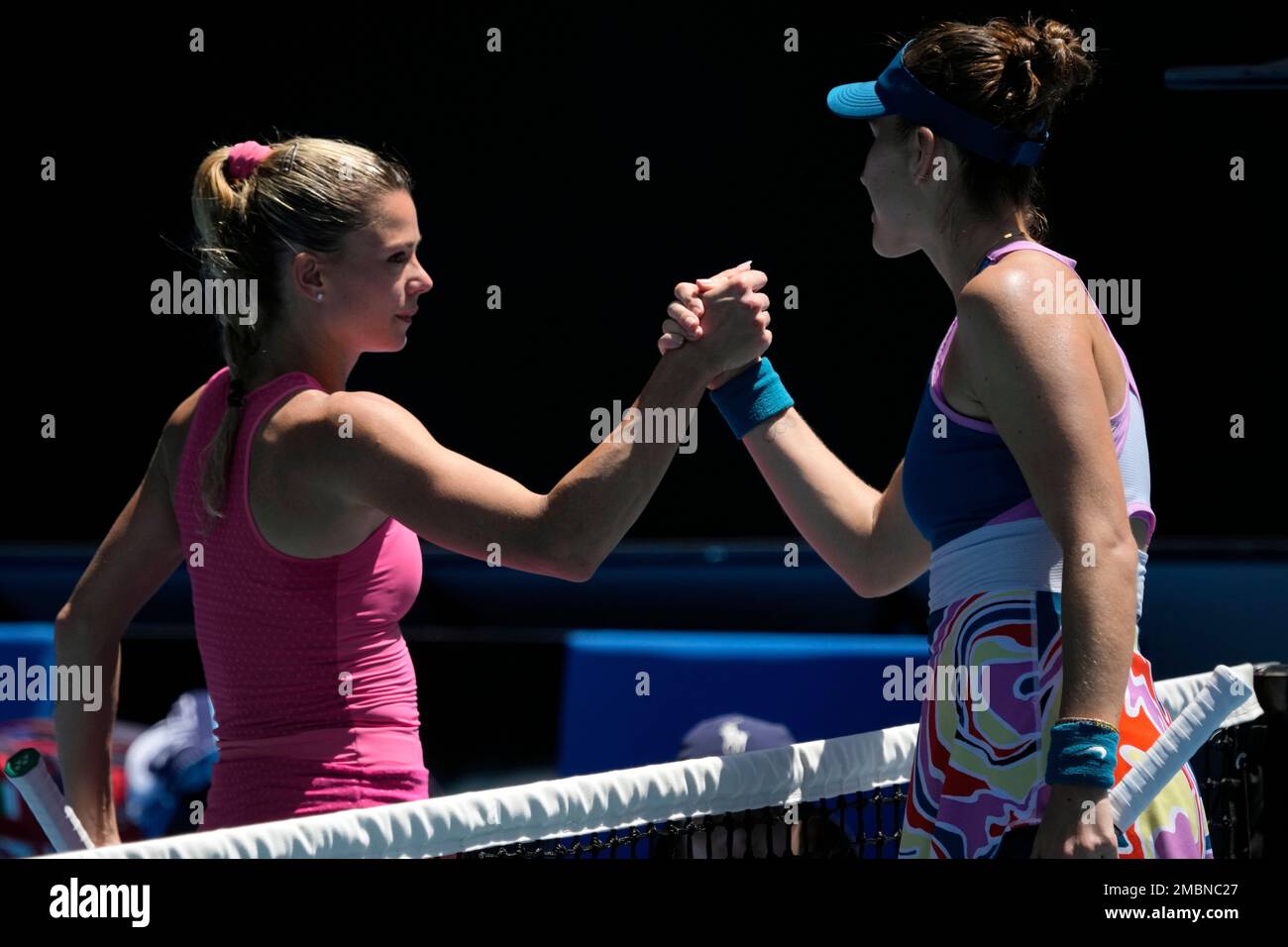 Belinda Bencic, right, of Switzerland is congratulated by Camila Giorgi ...