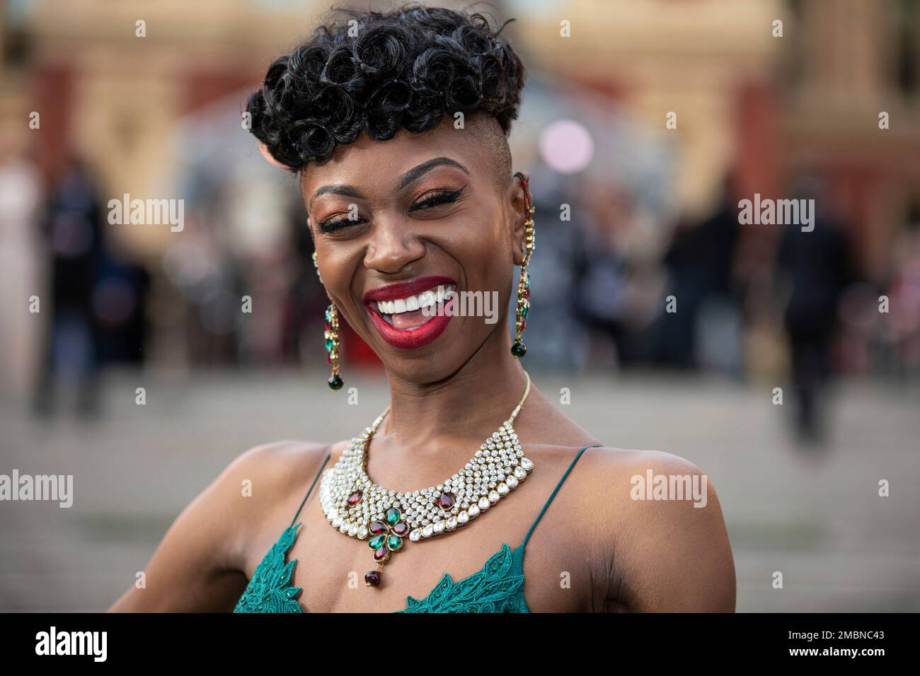 Miriam-Teak Lee poses for photographers upon arrival at the Olivier ...