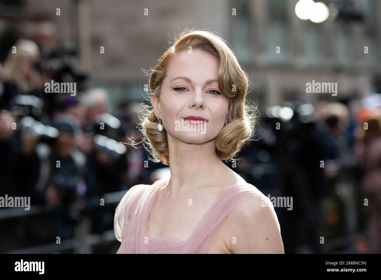 Amy Lennox poses for photographers upon arrival at the Olivier Awards ...