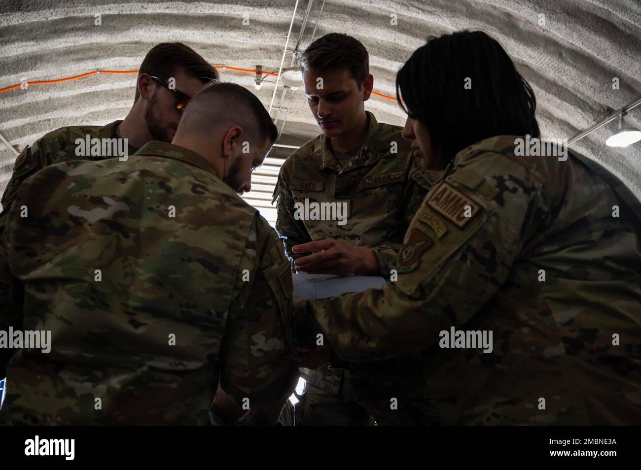 A group of U.S. Air Force Airmen, 354th Munitions Squadron ...