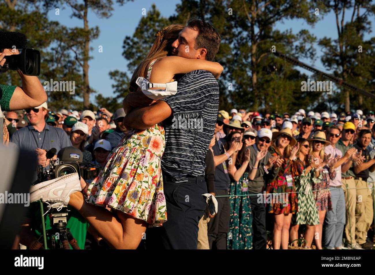 Scottie Scheffler lifts his wife Meredith Scudder off her feet after ...