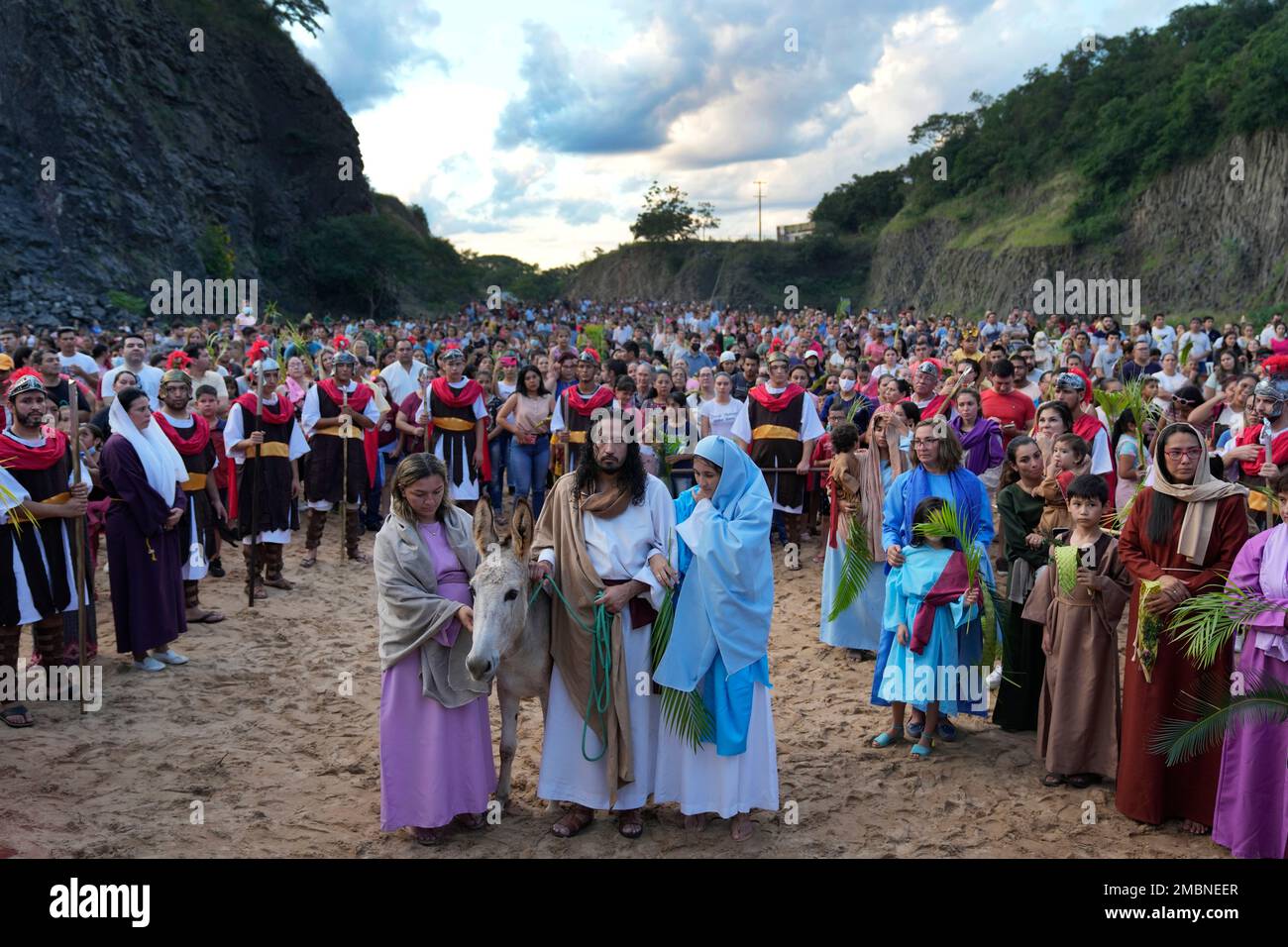 Actors perform during a Palm Sunday procession, in Nemby, Paraguay ...