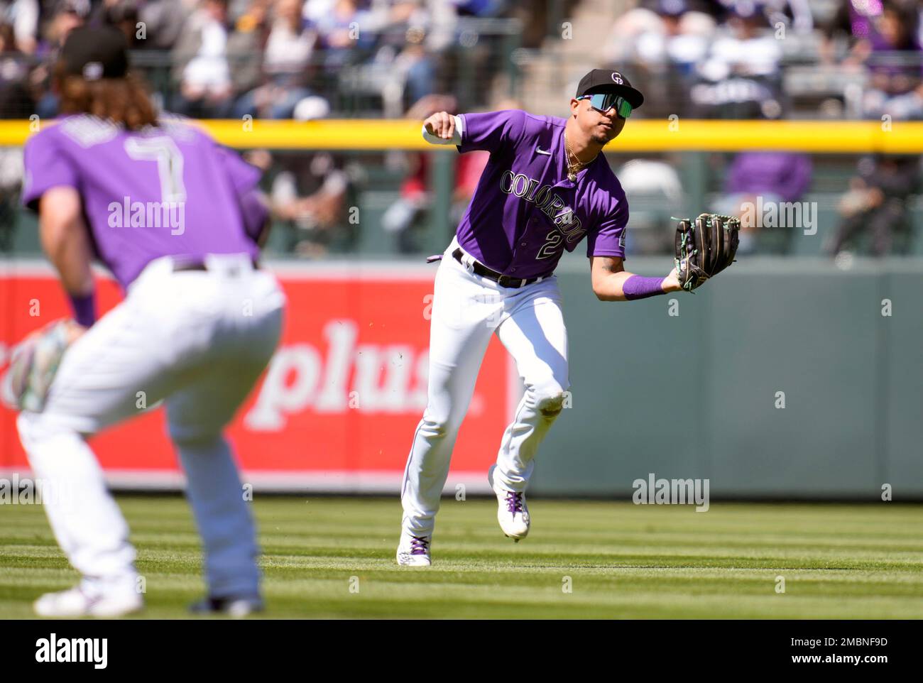 Colorado Rockies center fielder Yonathan Daza pulls in a fly ball off ...