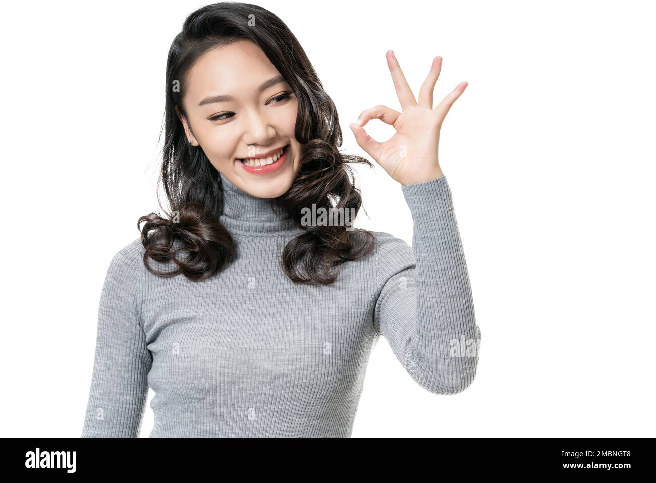 Smiling woman gestures ok hi-res stock photography and images - Alamy