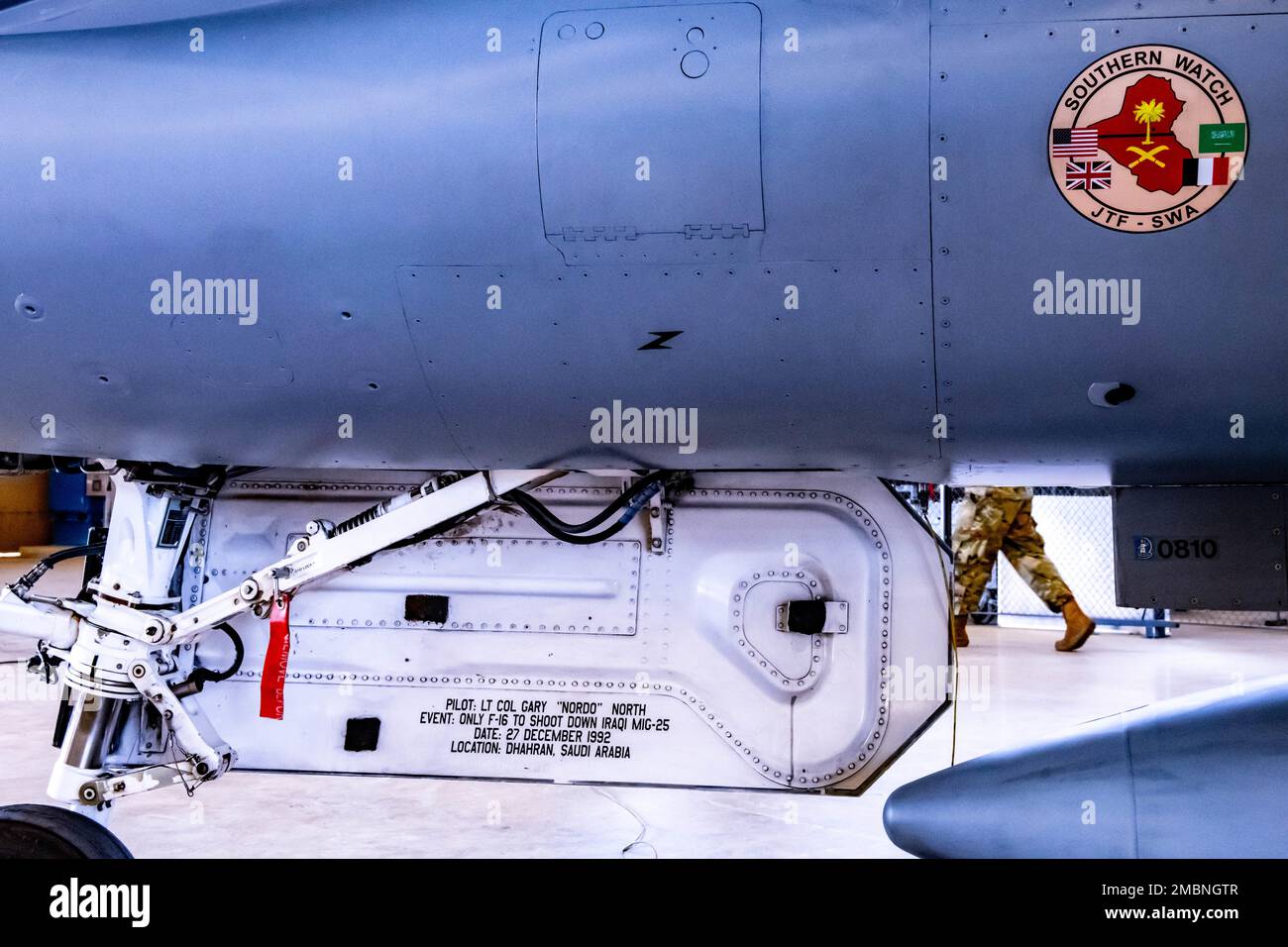 A bay door of an F-16D Fighting Falcon sits ajar during an unveiling ...