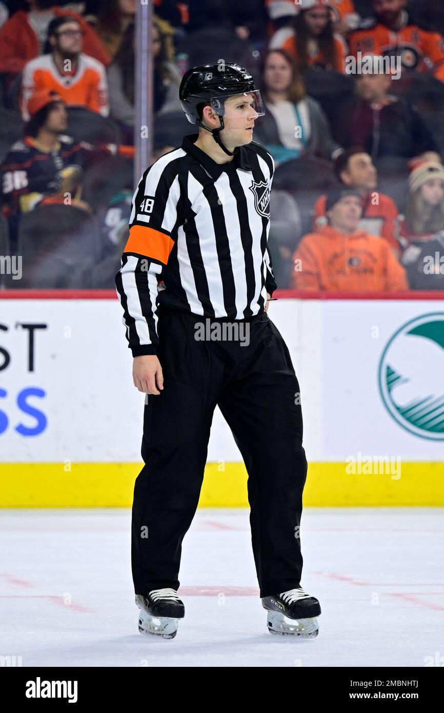 Referee Beaudry Halkidis in action during an NHL hockey game between ...