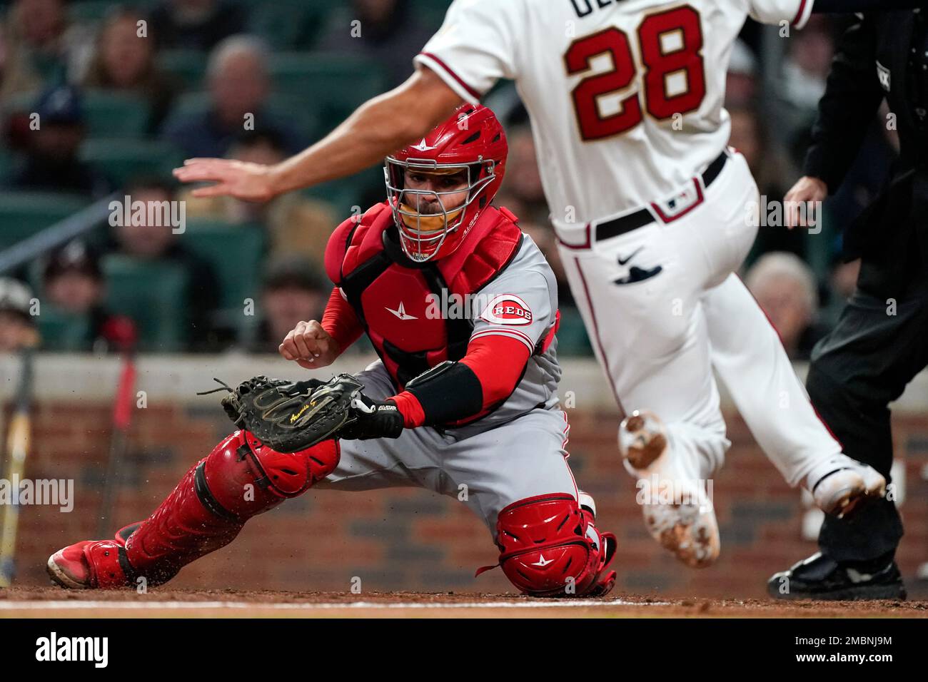 Cincinnati Reds catcher Aramis Garcia (33) prepares to tag out Atlanta ...