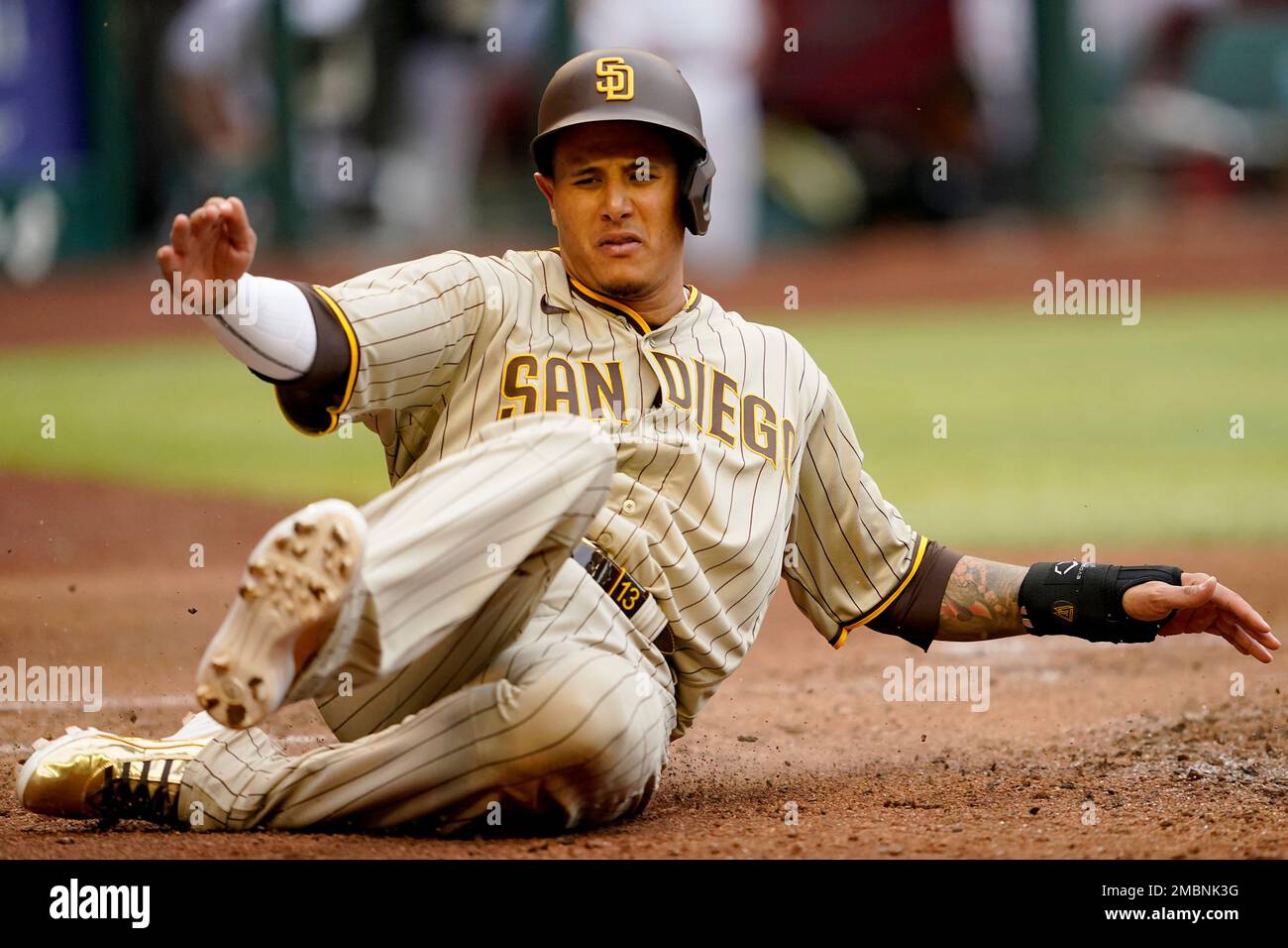 San Diego Padres' Manny Machado scores against the Arizona Diamondbacks ...