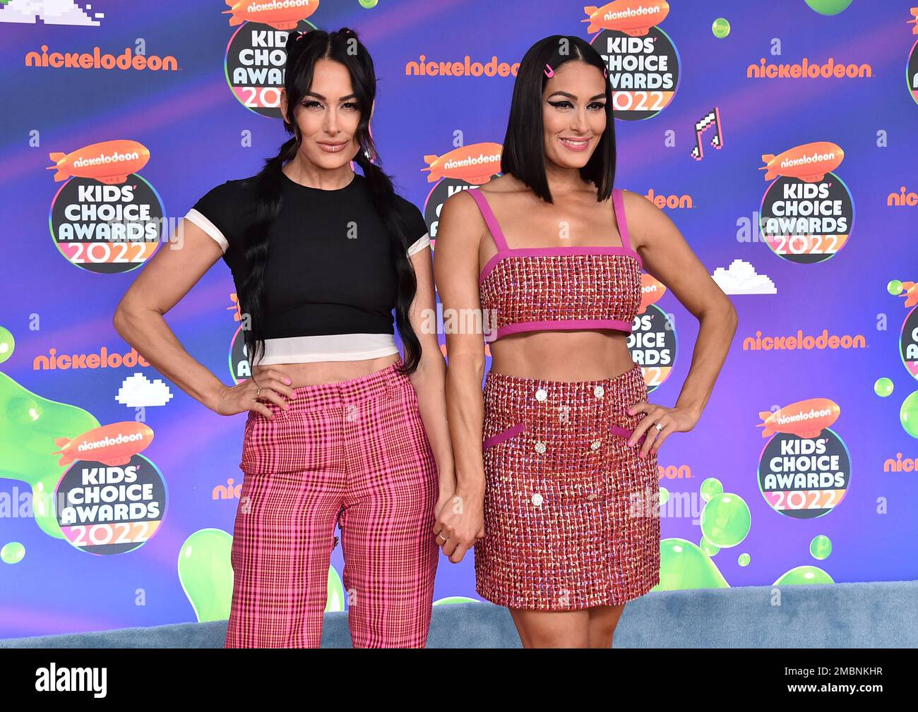 Brie Bella, left, and Nikki Bella arrive at the Kids Choice Awards on ...