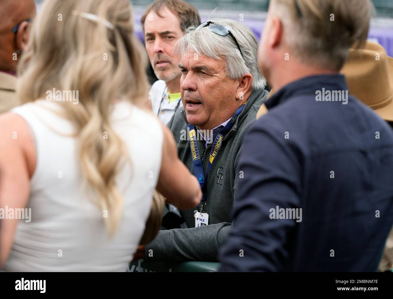 Colorado Rockies general manager Bill Schmidt talks with reporters as ...