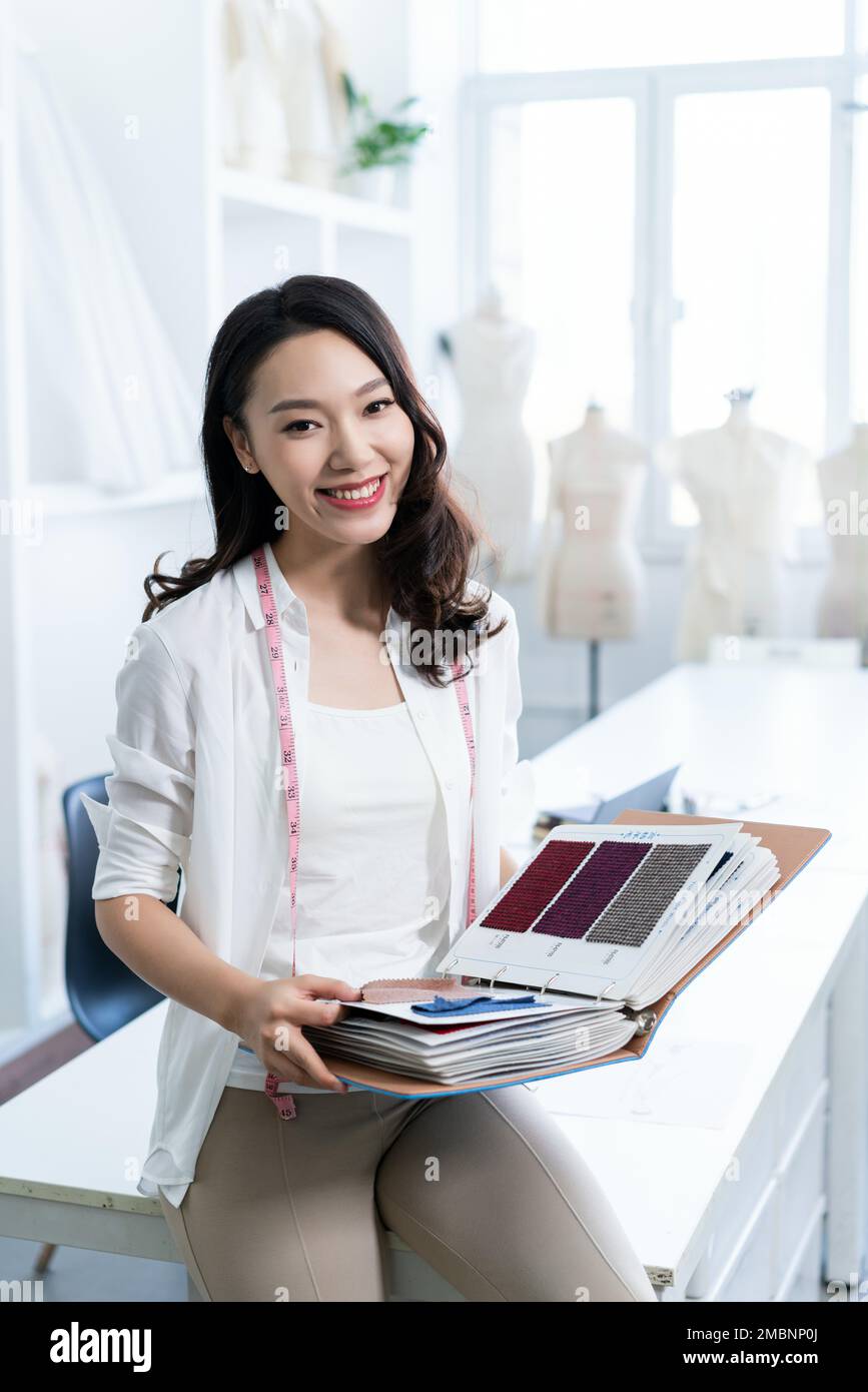 Young female fashion designers Stock Photo - Alamy