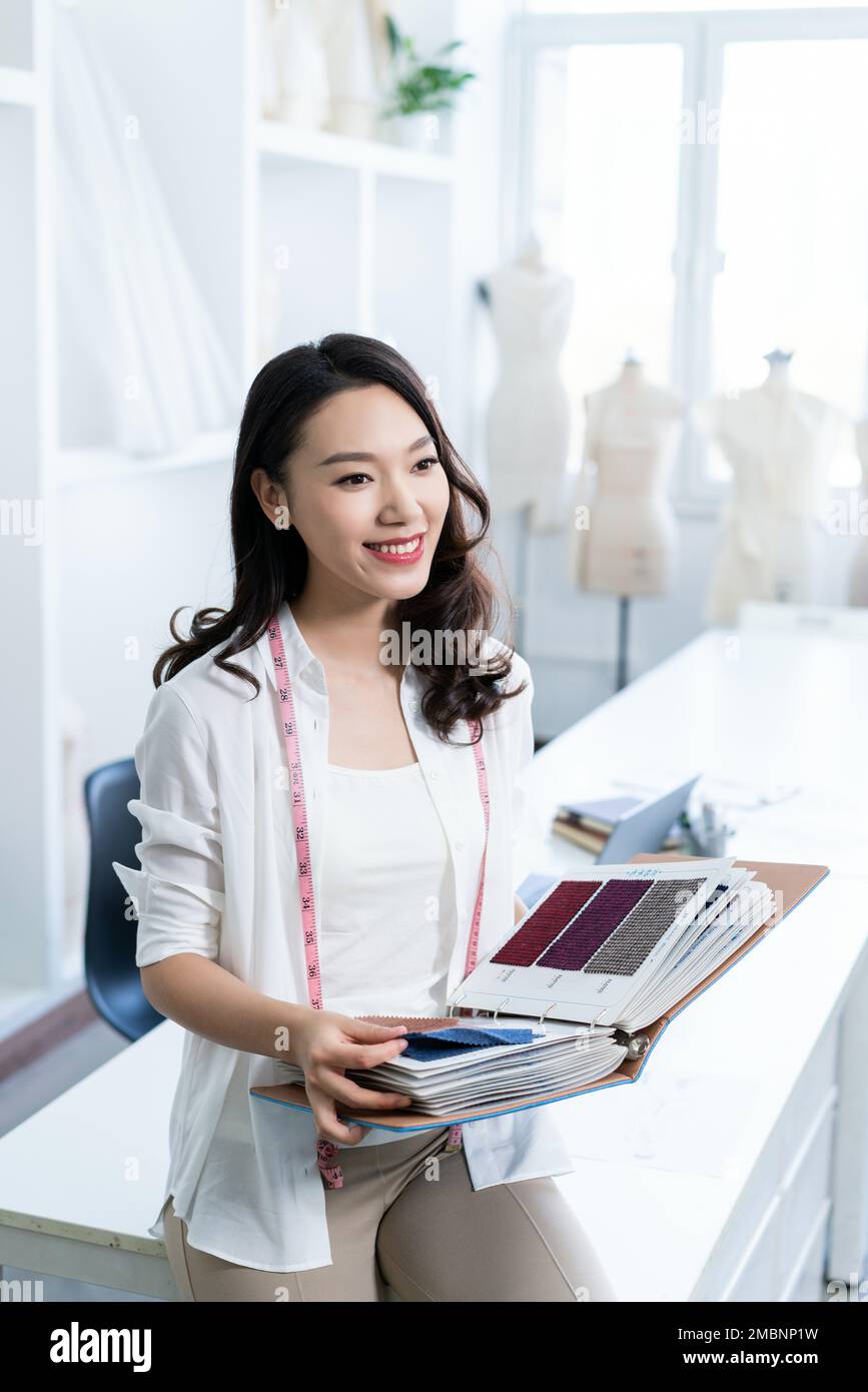 Young female fashion designers Stock Photo - Alamy