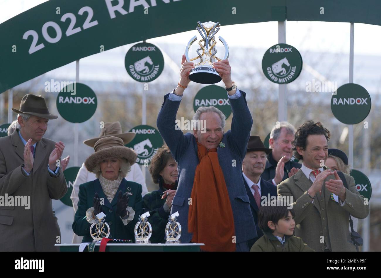 Robert Waley-Cohen owner of Noble Yeats holds up the winner trophy ...