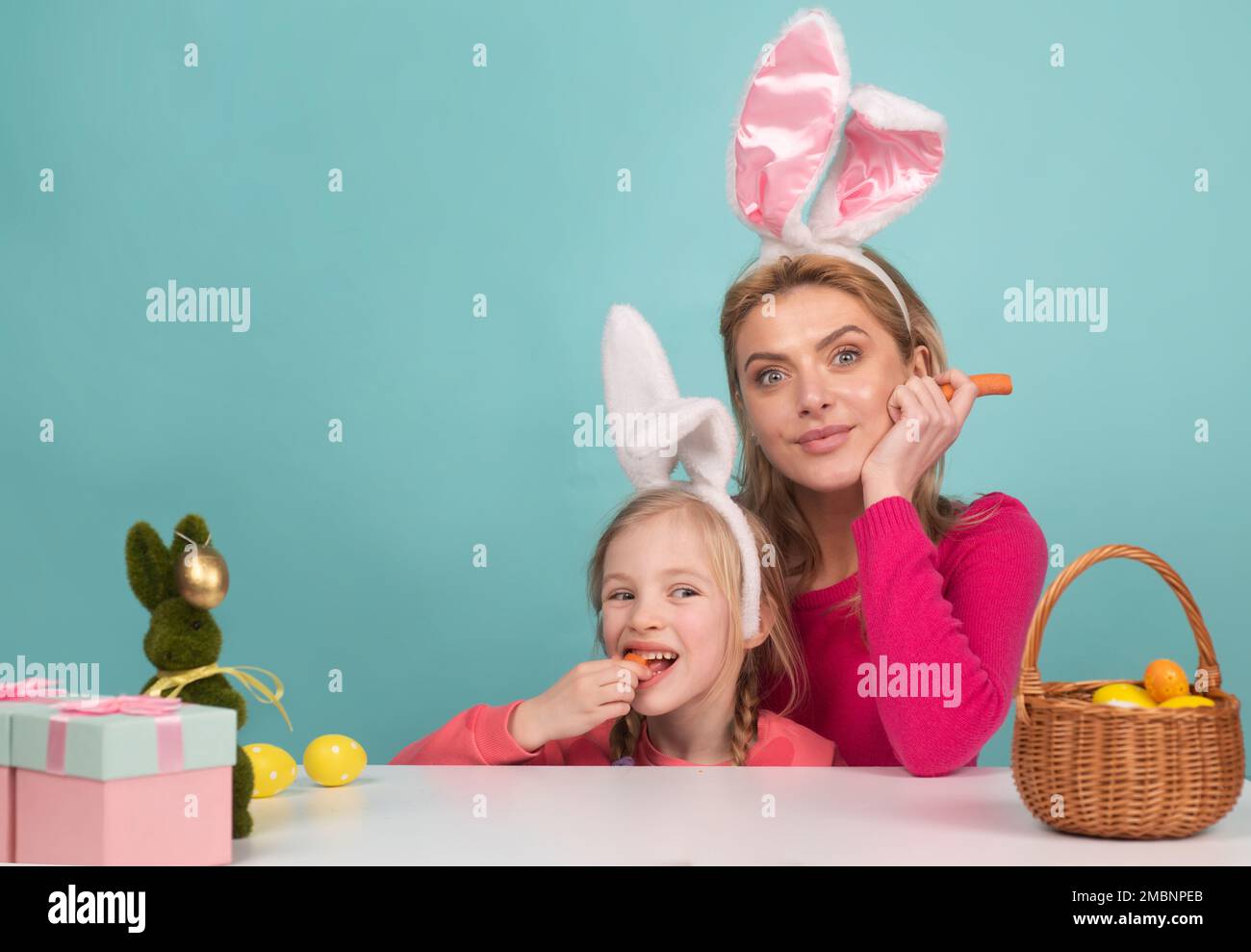 Family easter. Mom with daughter are preparing for Easter. Mother and ...