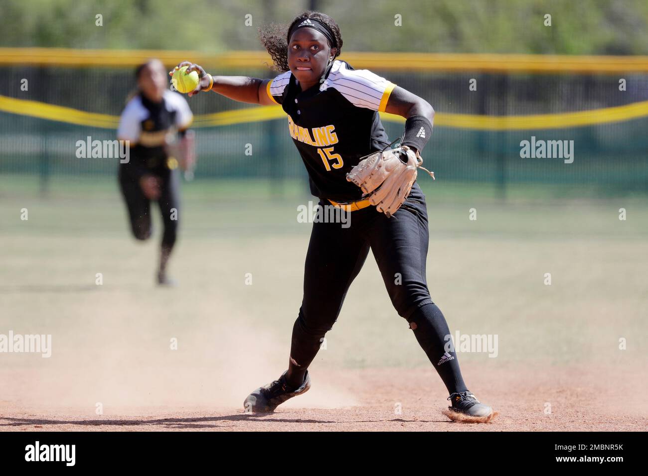 Grambling infielder Anaiyah Fultz (15) fields a grounder to first base ...