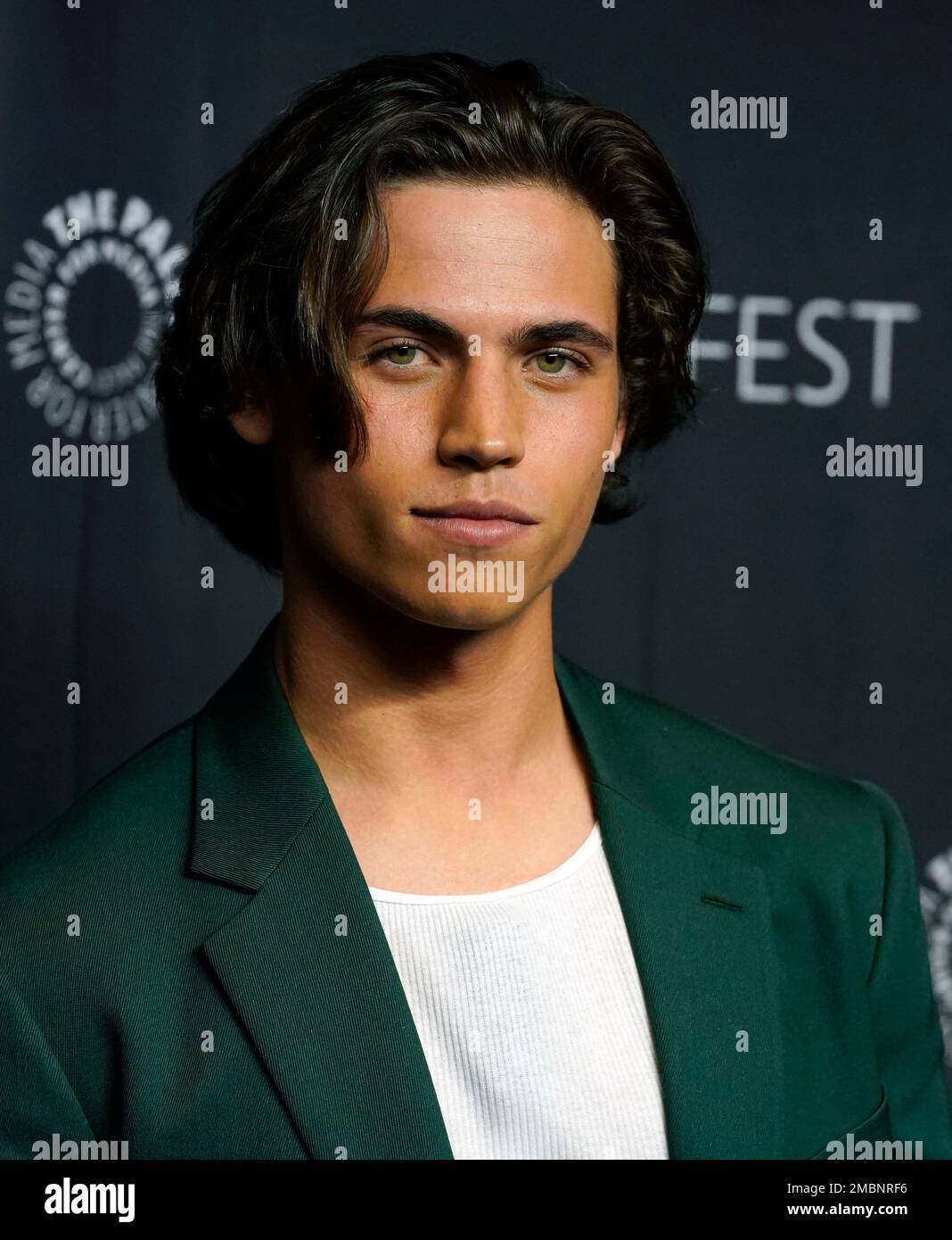 Tanner Buchanan poses at a screening of the Netflix show "Cobra Kai ...