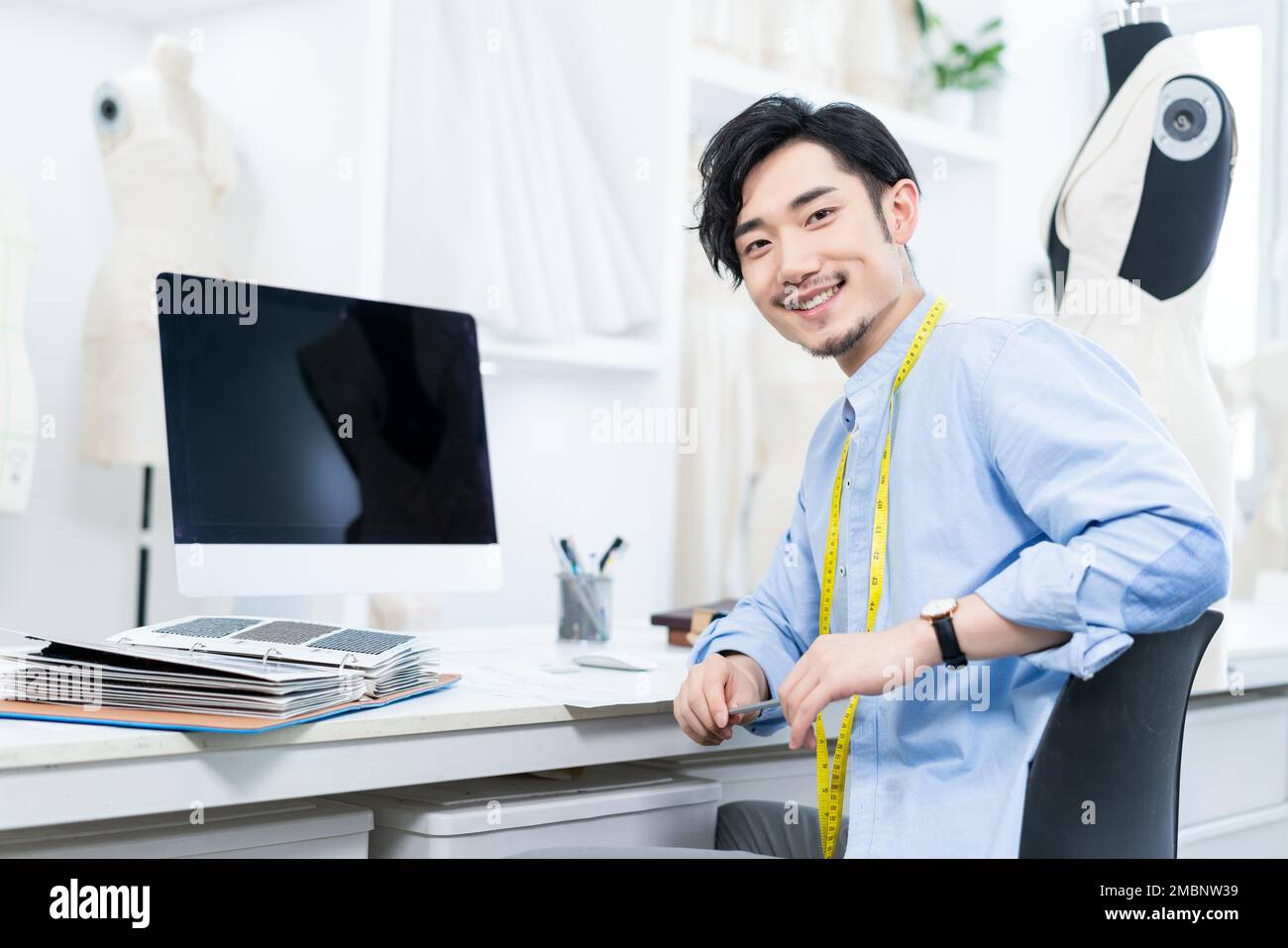 Young male clothing designer Stock Photo - Alamy