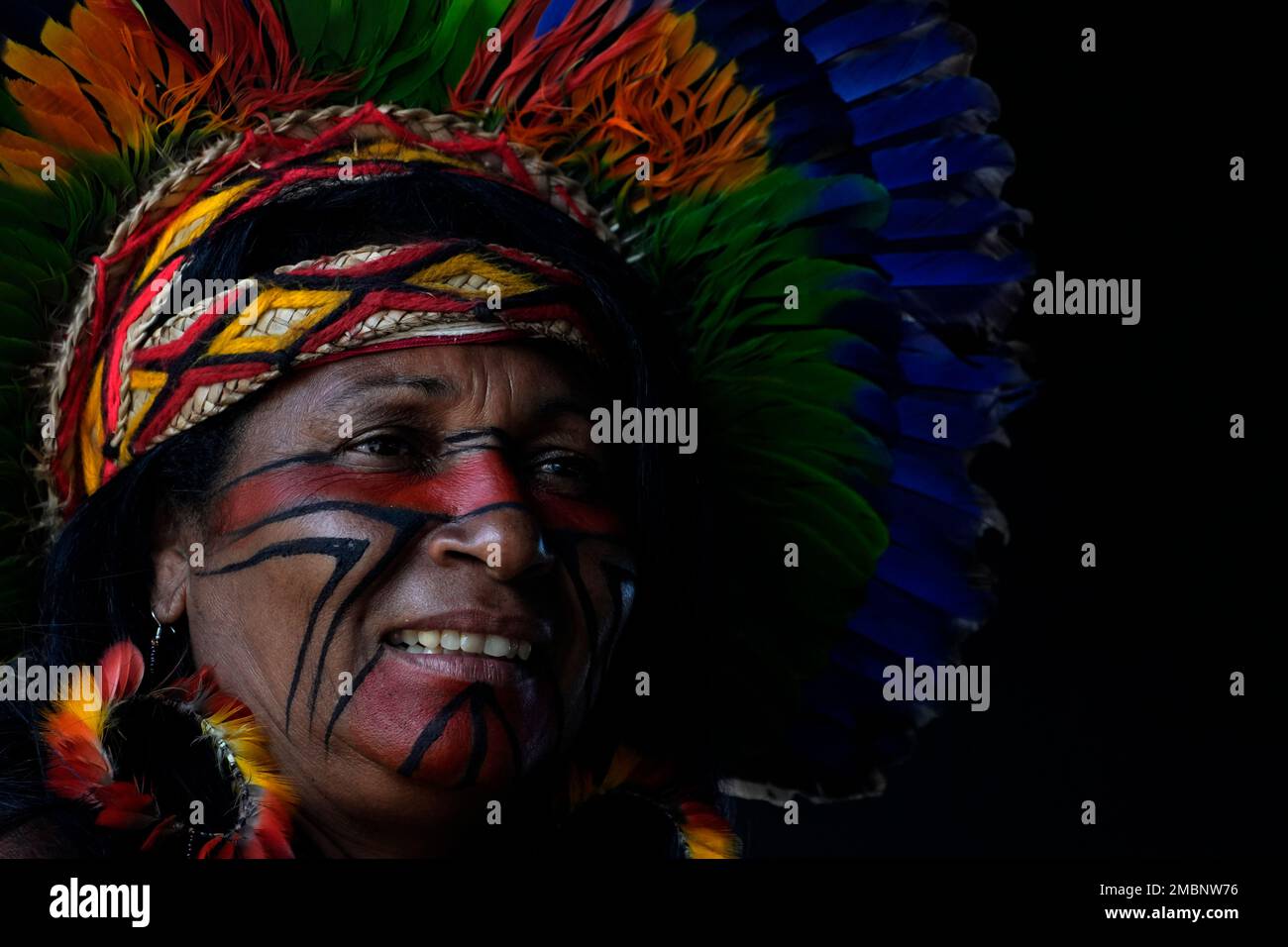 A Pataxo Indigenous woman attends a ceremony called the Meeting of the ...