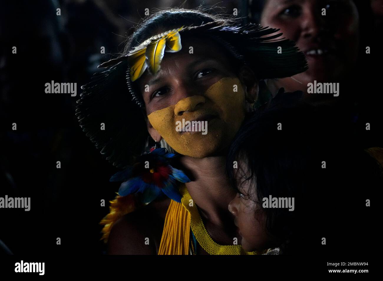 A Pataxo Indigenous woman and her daughter attend a ceremony called the ...