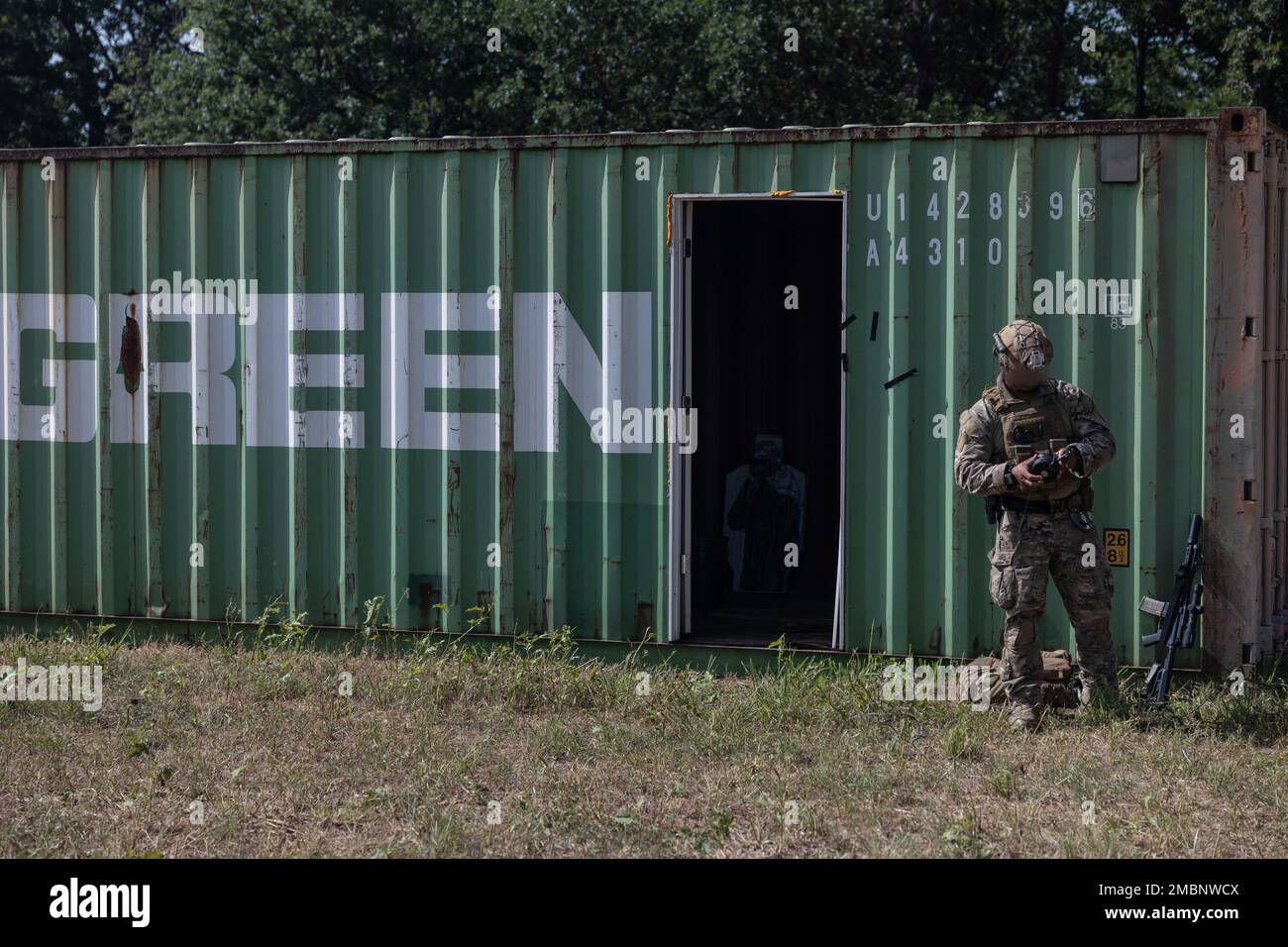 An explosive ordnance disposal technician with Marine Forces Special ...