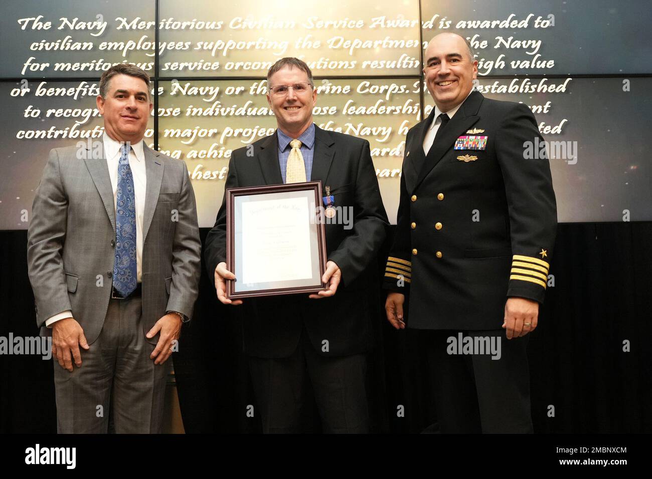 Mark Giewont receives the Navy Meritorious Civilian Service Award at ...