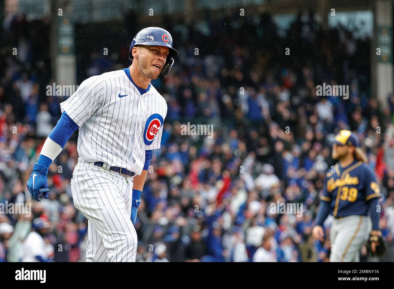 Chicago Cubs' Nico Hoerner rounds the bases after hitting a two-run ...