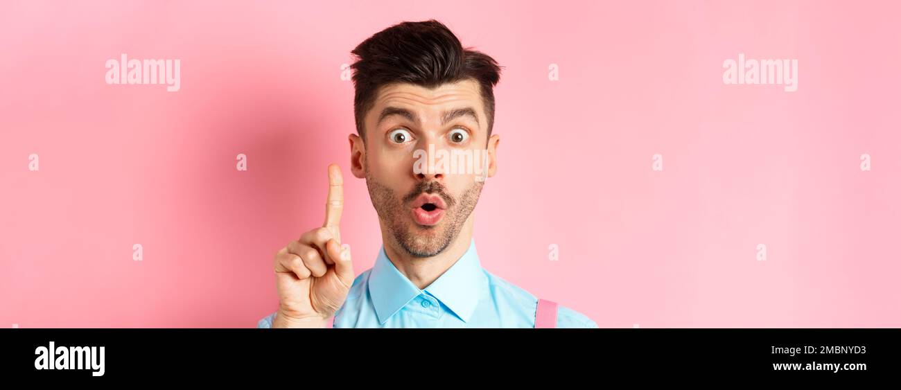 Close-up of excited guy pitching an idea, raising finger and saying ...