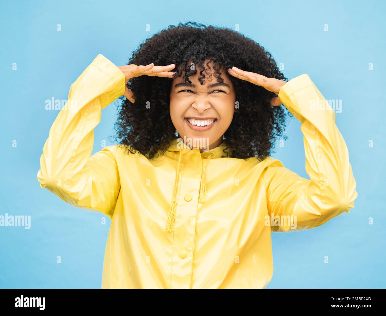 Face, thinking and laugh with a black woman on a blue background in ...