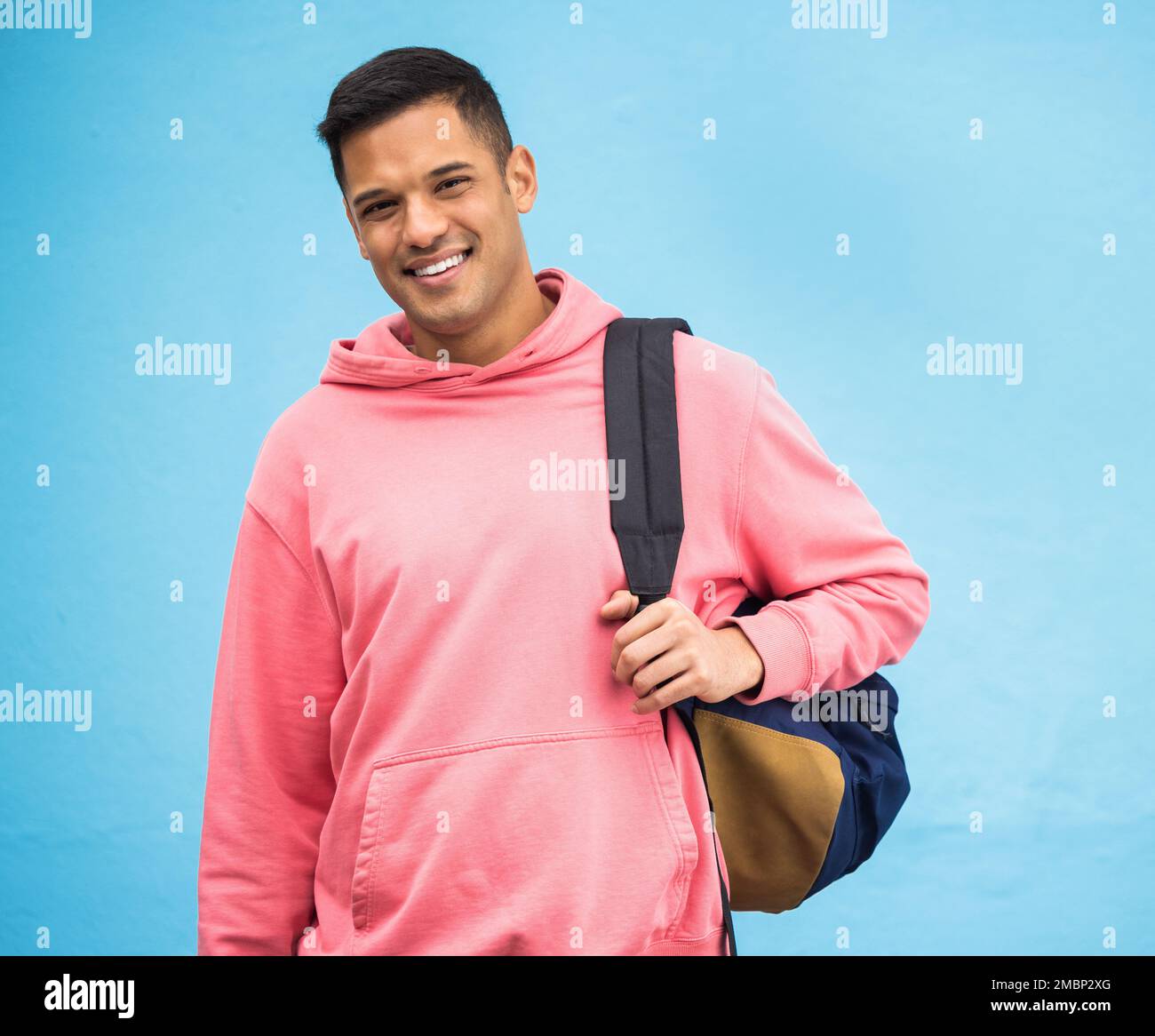 Portrait happy man backpack hi-res stock photography and images - Alamy