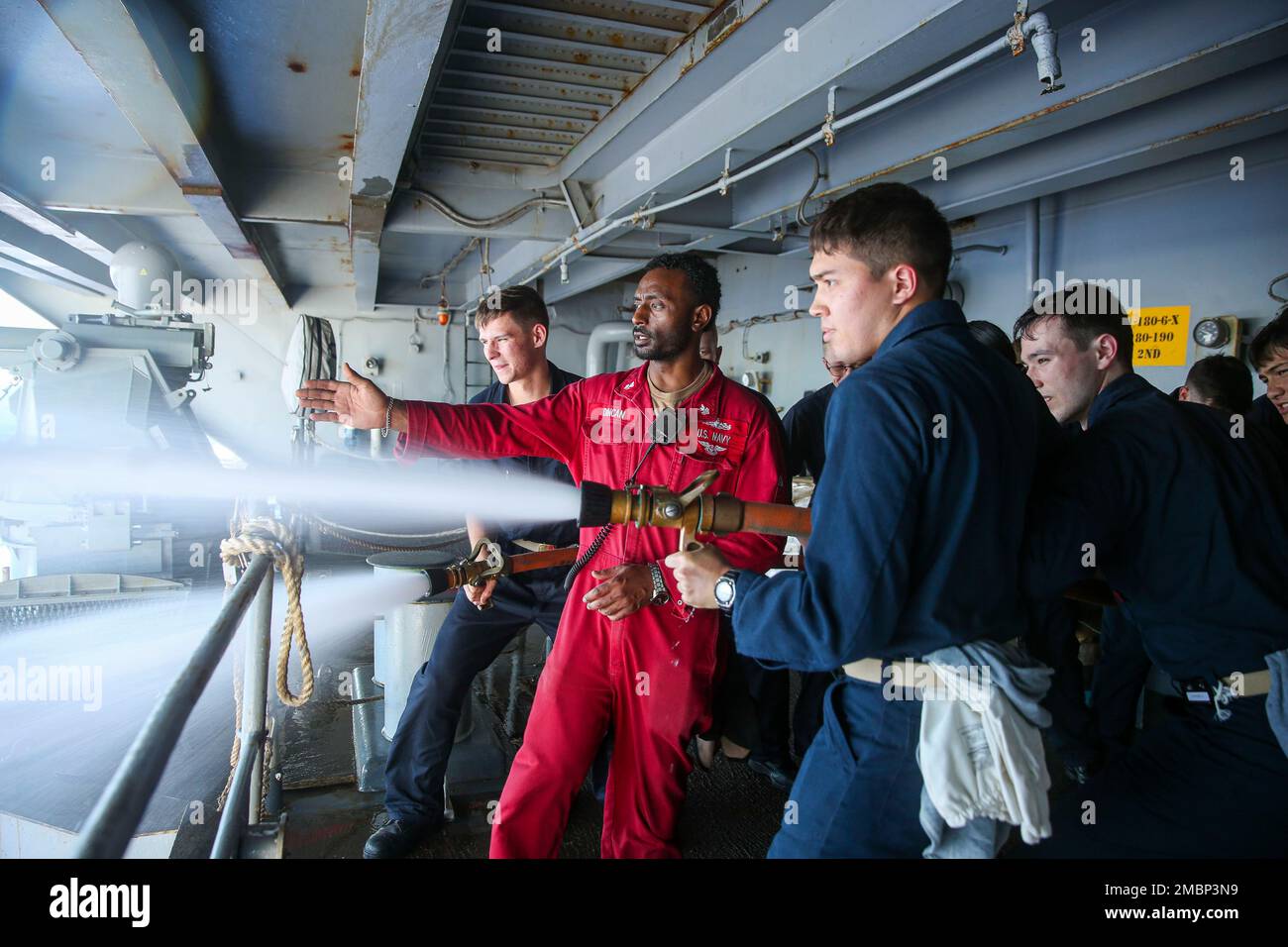 PHILIPPINE SEA (June 18, 2022) Damage Controlman 1st Class Keith Duncan ...