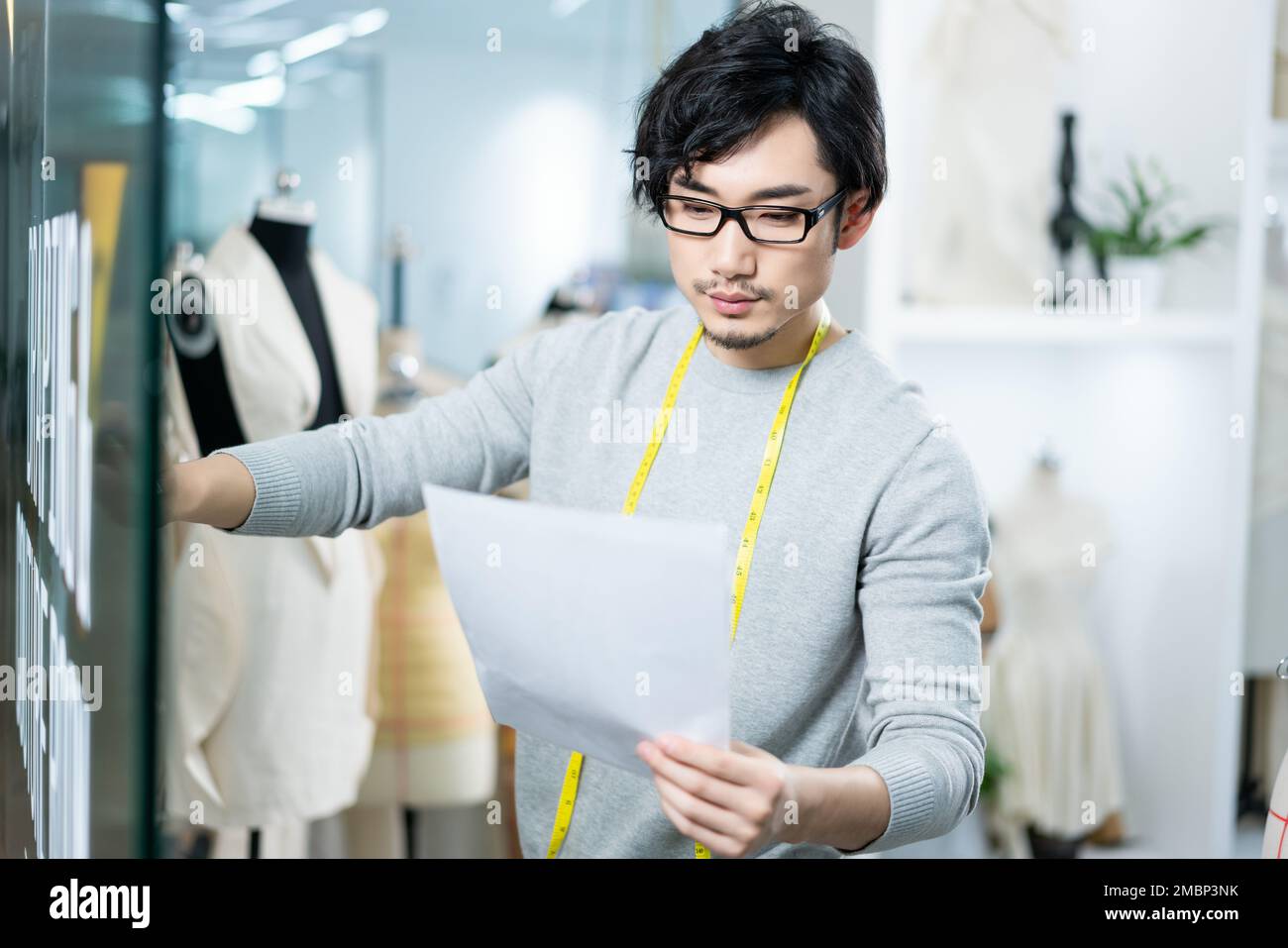 Young male clothing designer Stock Photo - Alamy