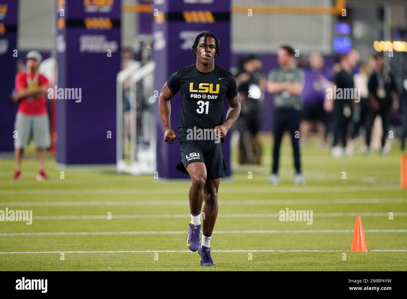 LSU safety Cameron Lewis runs through drills during LSU Pro Day in ...