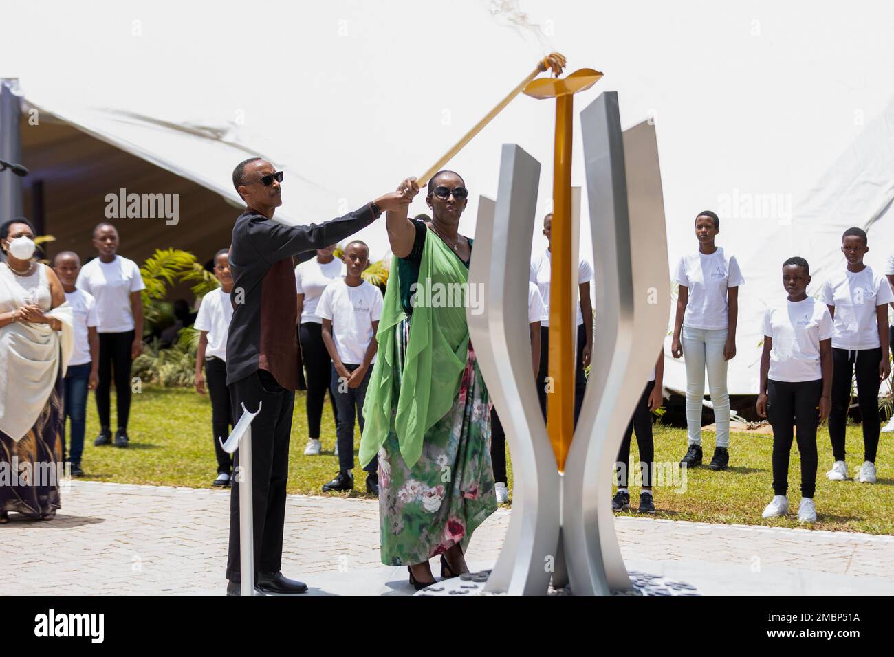 Rwanda's president Paul Kagame, left, and his wife Jeannette Kagame ...